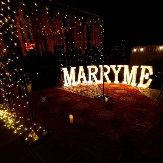 Marriage Proposal Decoration On Rooftop At Home - Book Now